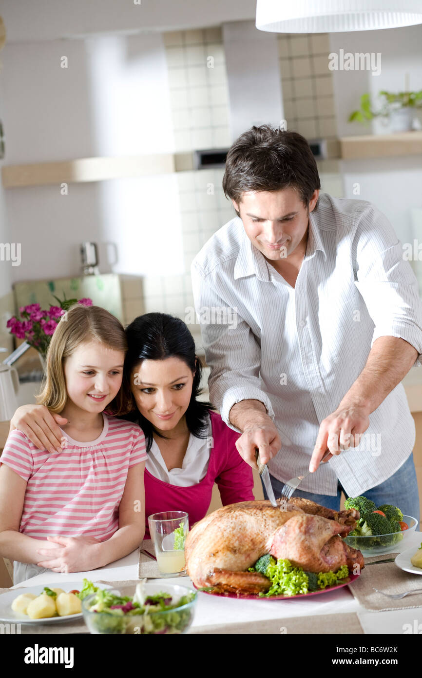 Young woman eating turkey model hi-res stock photography and images - Alamy