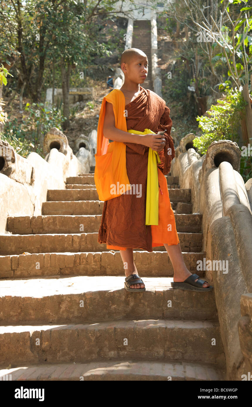 Buddhist monk boy orange hi-res stock photography and images - Alamy