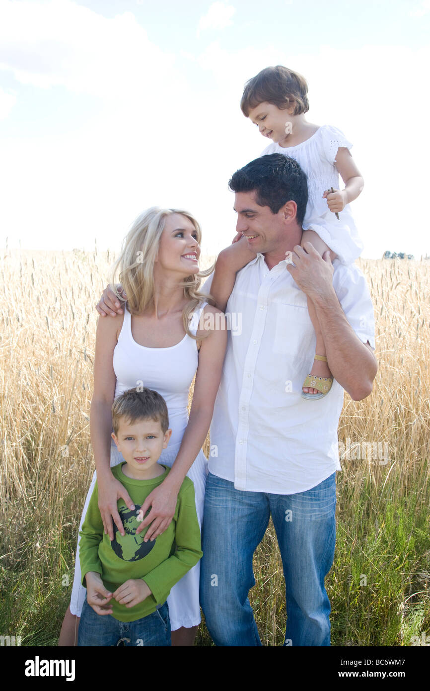 family walking on the field Stock Photo - Alamy