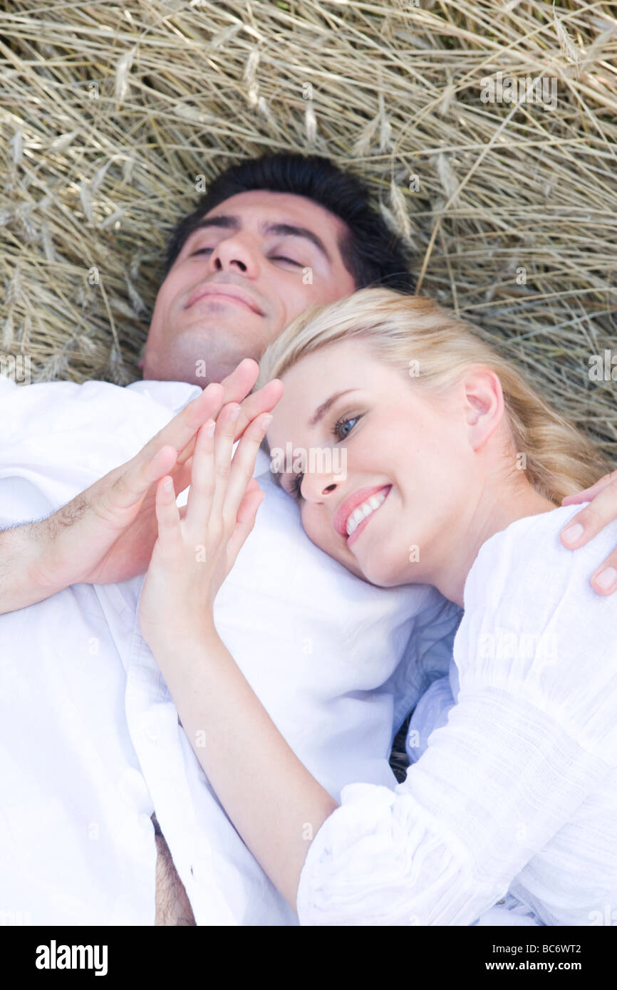 couple relaxing on crop Stock Photo - Alamy