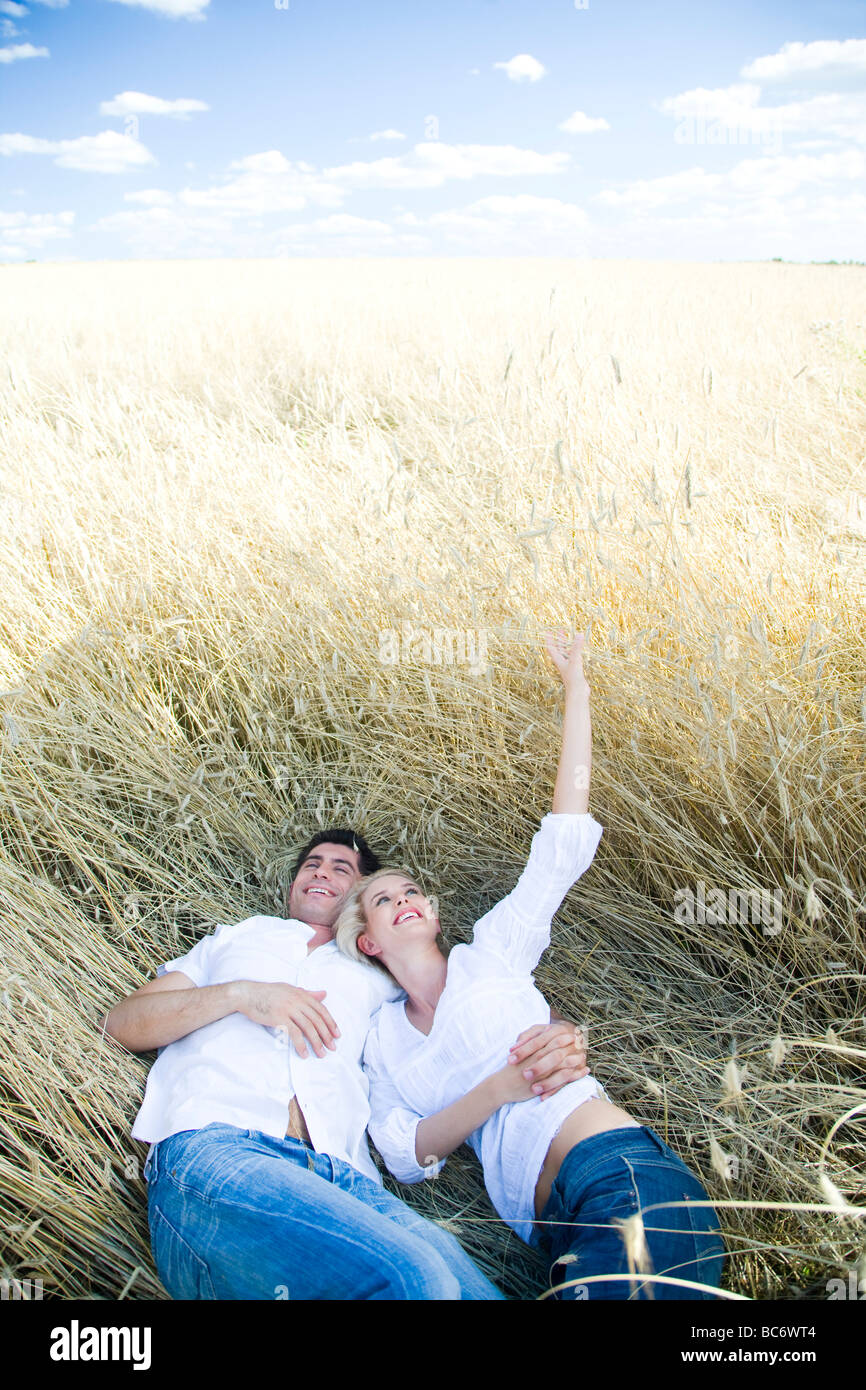 couple relaxing on crop Stock Photo - Alamy