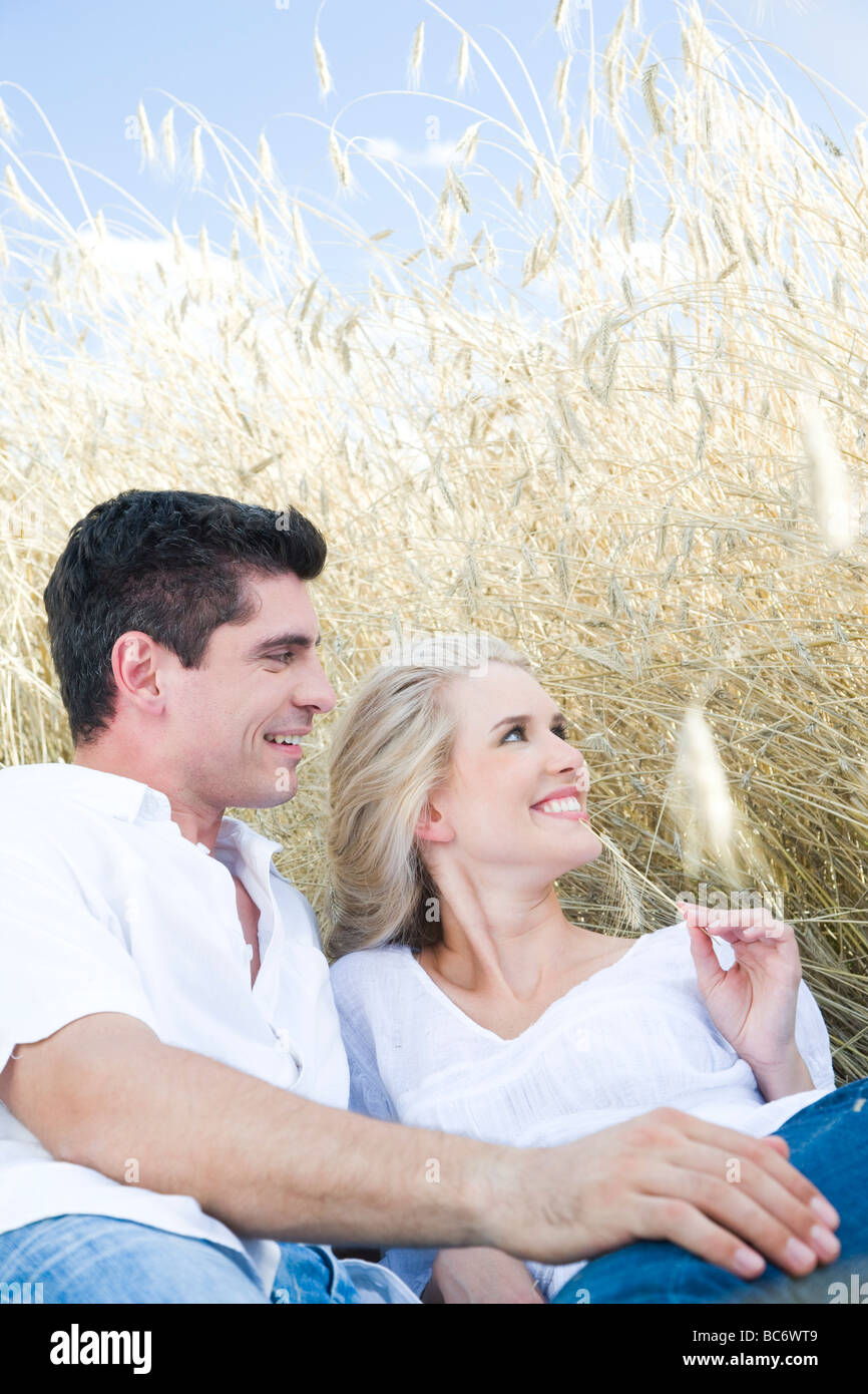 couple relaxing on crop Stock Photo - Alamy