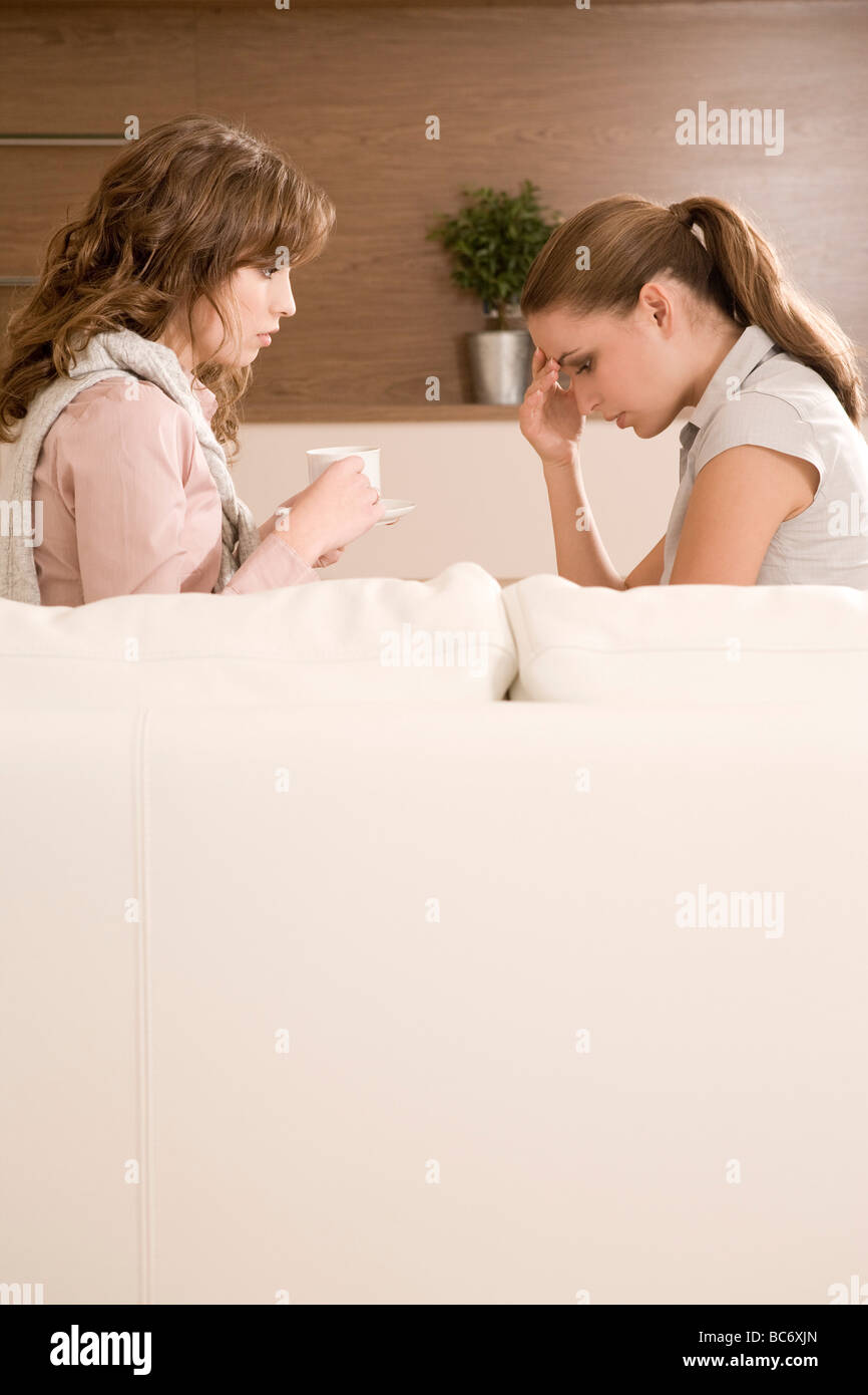 Two girls talking sad hi-res stock photography and images - Alamy