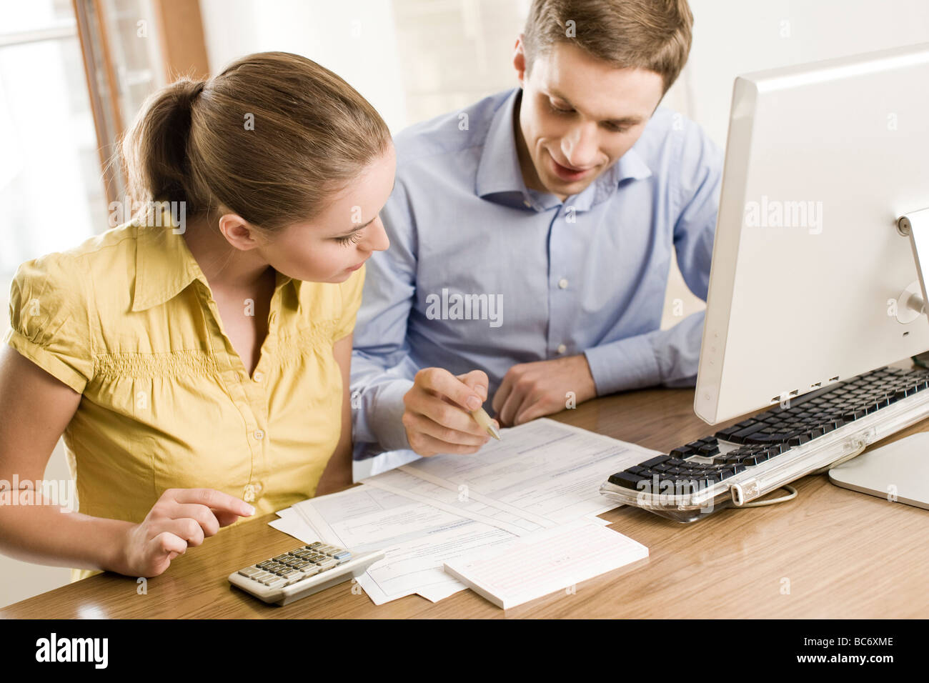 Man woman fill up documents hi-res stock photography and images - Alamy