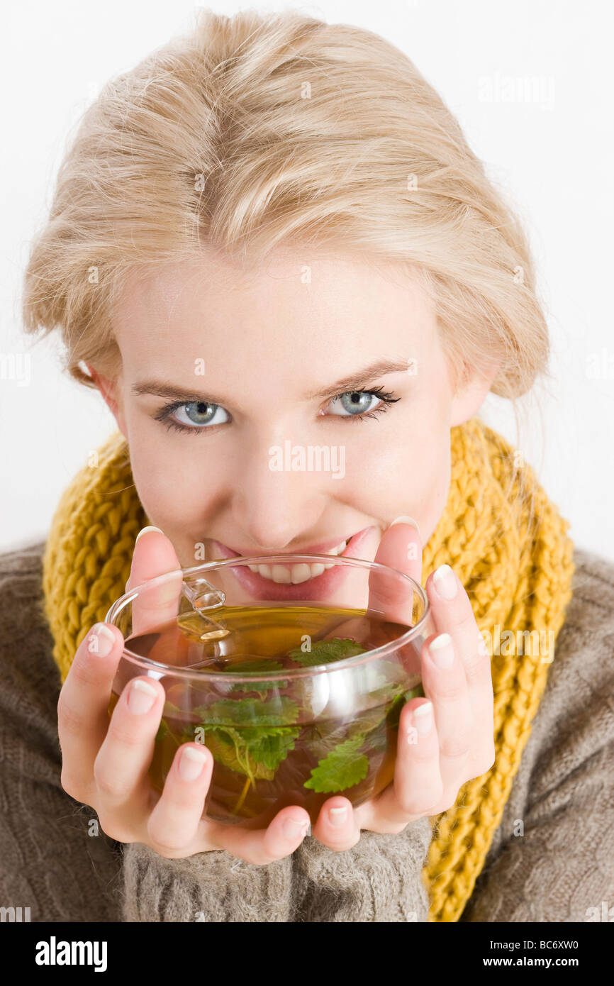 young woman drinking tea Stock Photo - Alamy