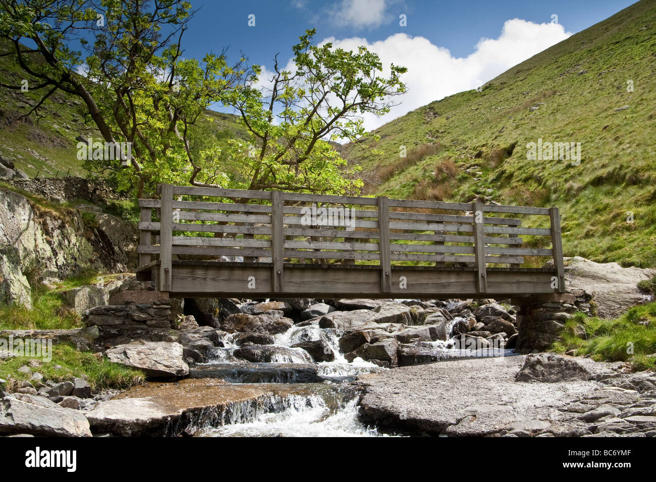 A bridge over a stream Stock Photo - Alamy