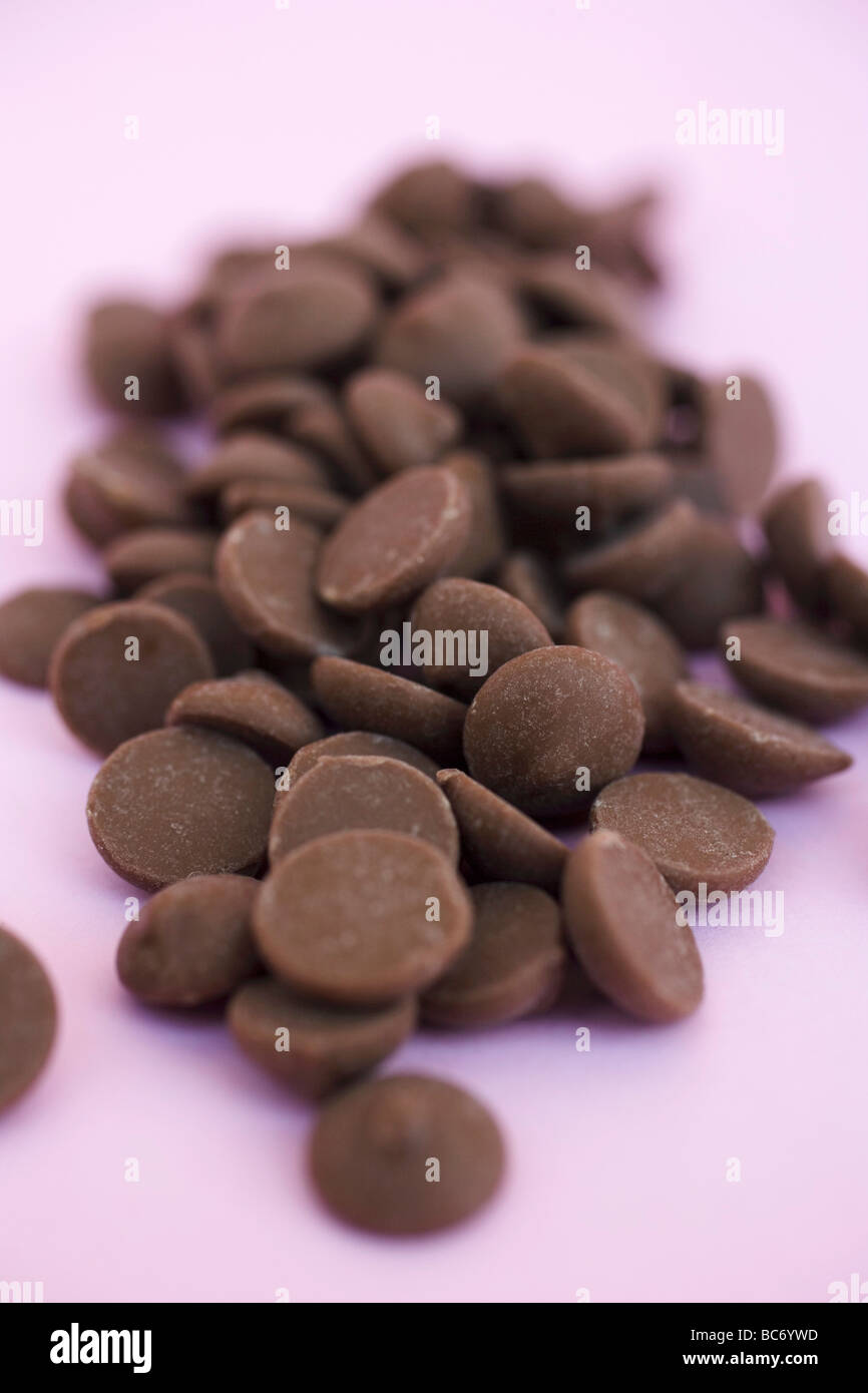 A heap of chocolate buttons Stock Photo - Alamy