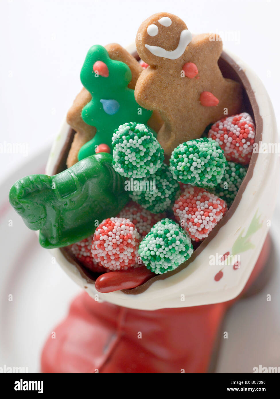 Christmas biscuits and sweets in chocolate boot Stock Photo - Alamy