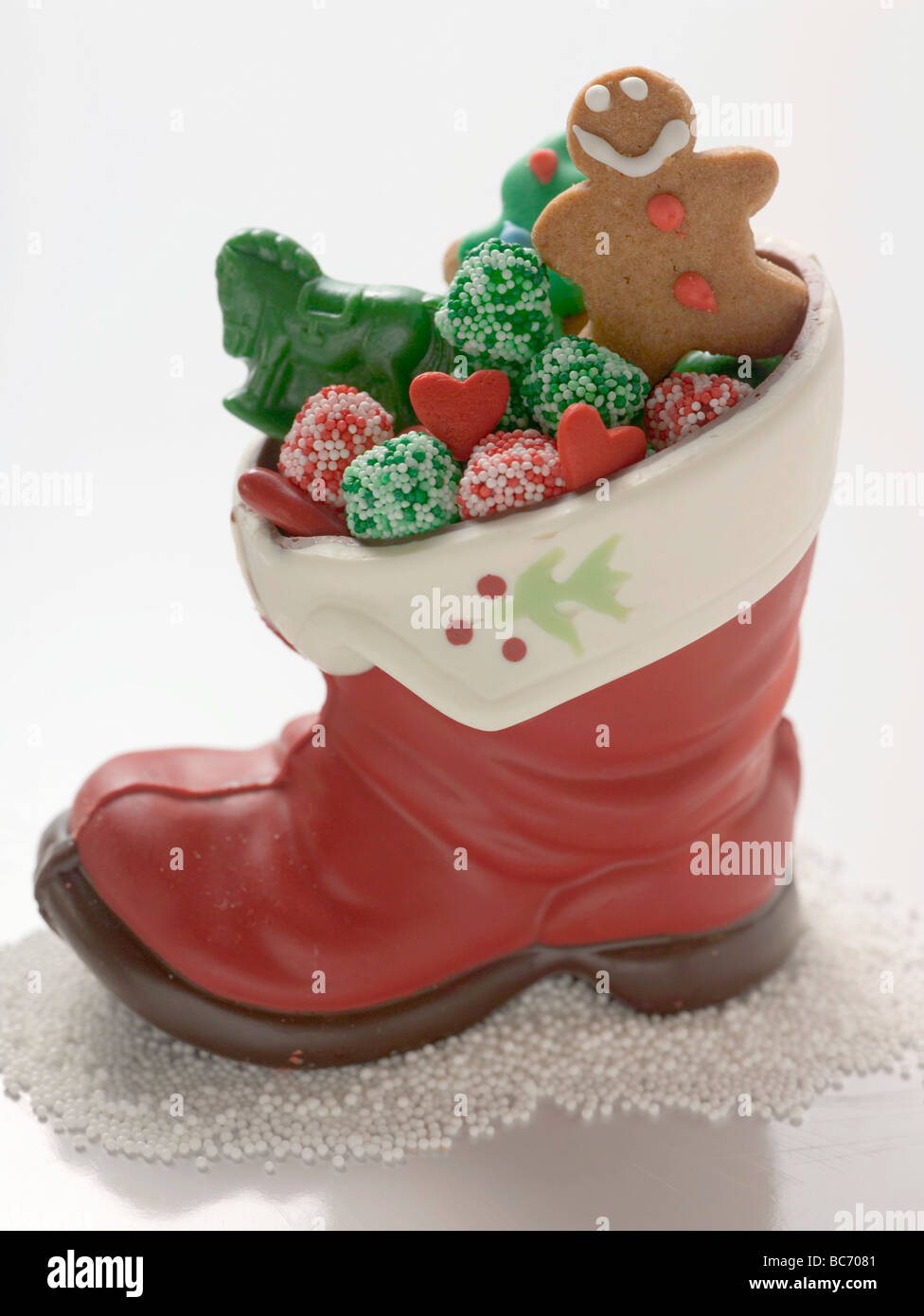 Christmas biscuits and sweets in chocolate boot Stock Photo - Alamy