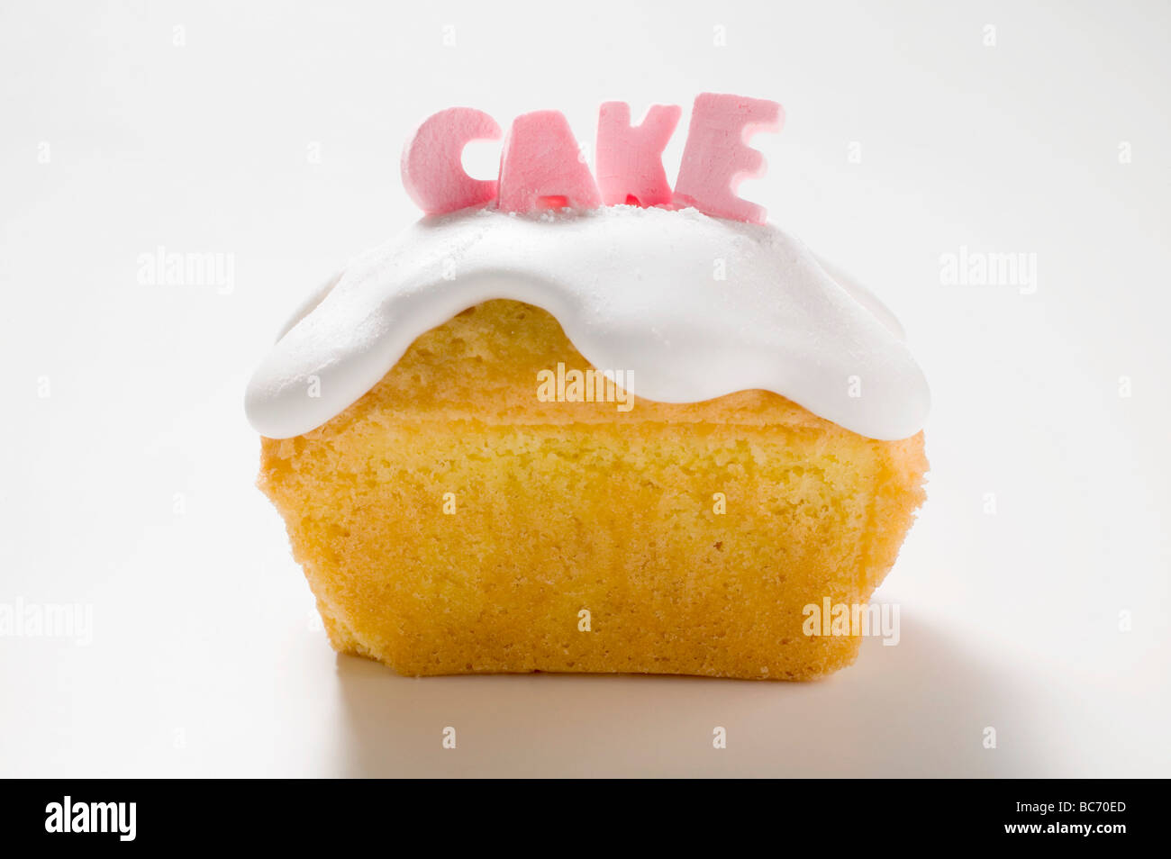 Iced loaf cake with the word 'Cake' Stock Photo - Alamy