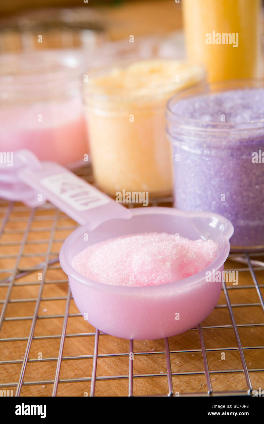 Coloured sugar for decorating biscuits on cake rack Stock Photo - Alamy