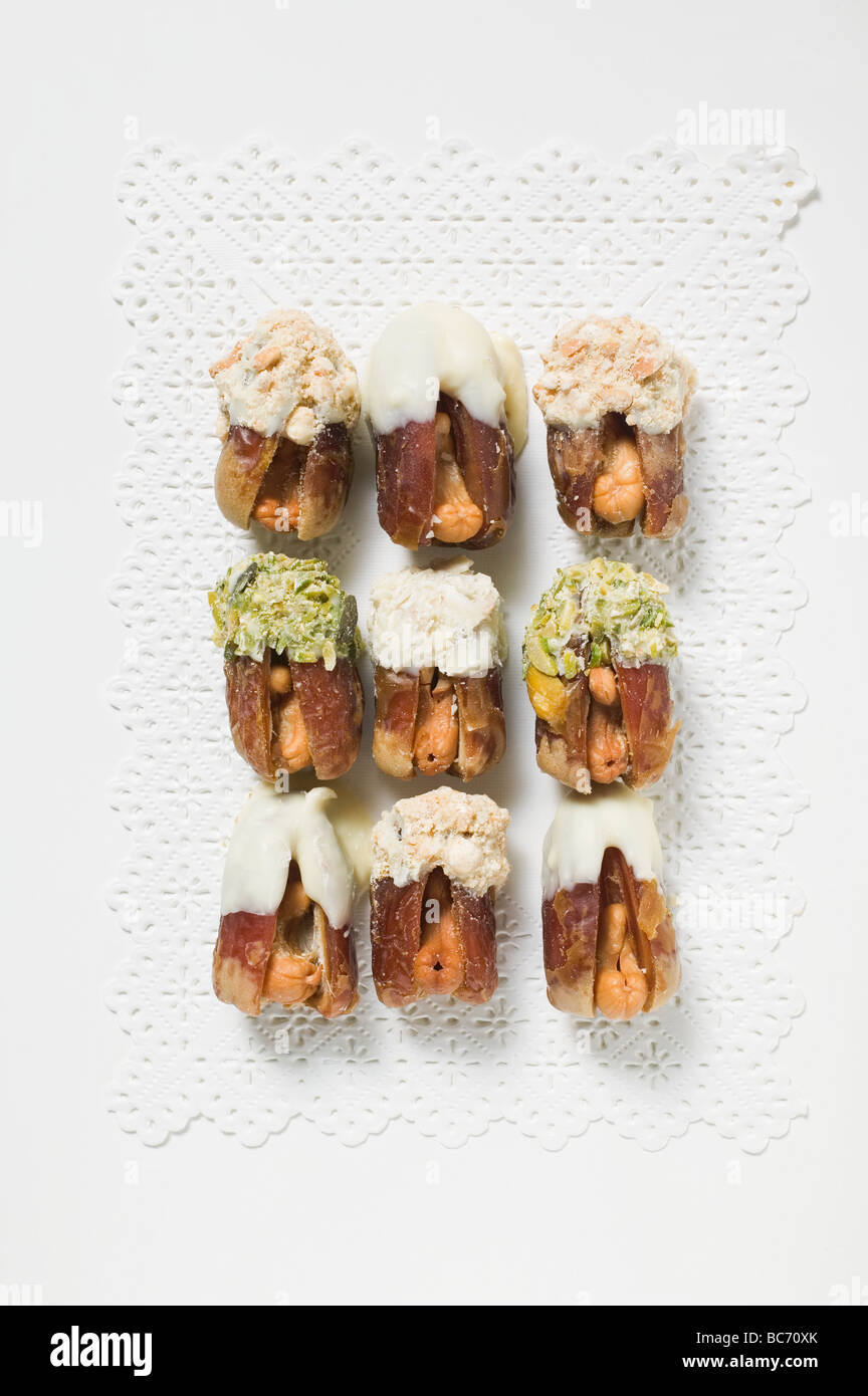 Stuffed dates (Date sweets Stock Photo - Alamy