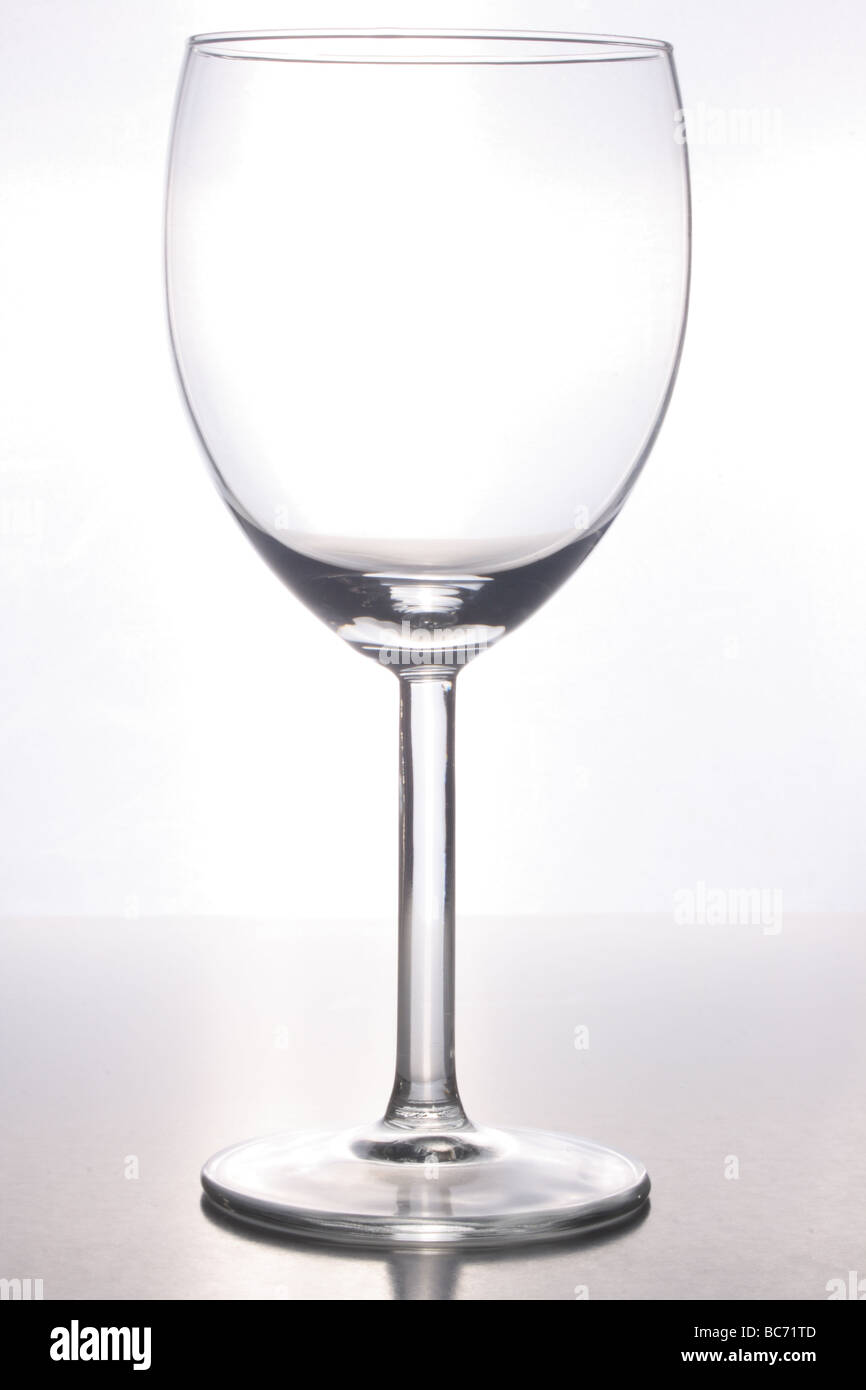 A single empty clear glass Stock Photo - Alamy