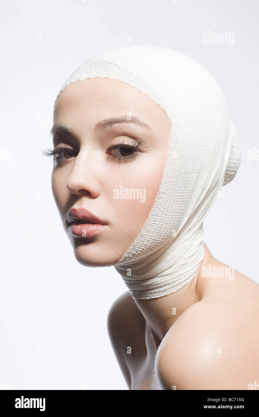 beauty woman with bandage around head Stock Photo - Alamy