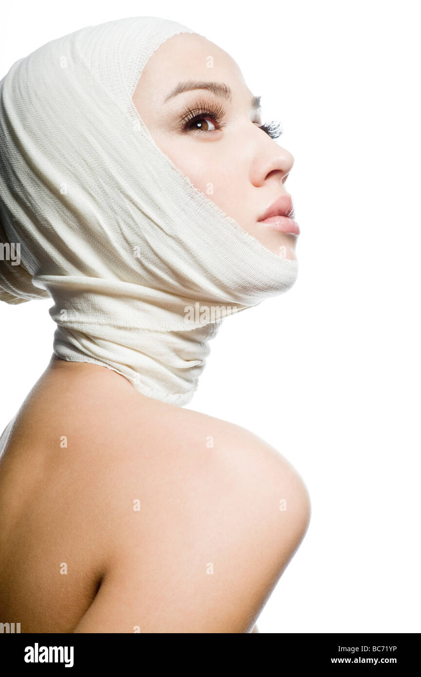 Woman with bandage around her head hi-res stock photography and images ...