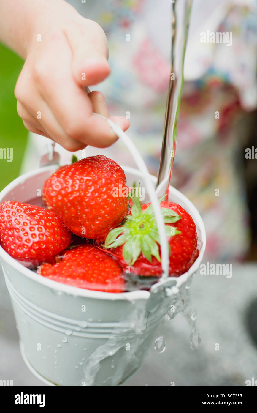 Washing fruit bucket hi-res stock photography and images - Alamy
