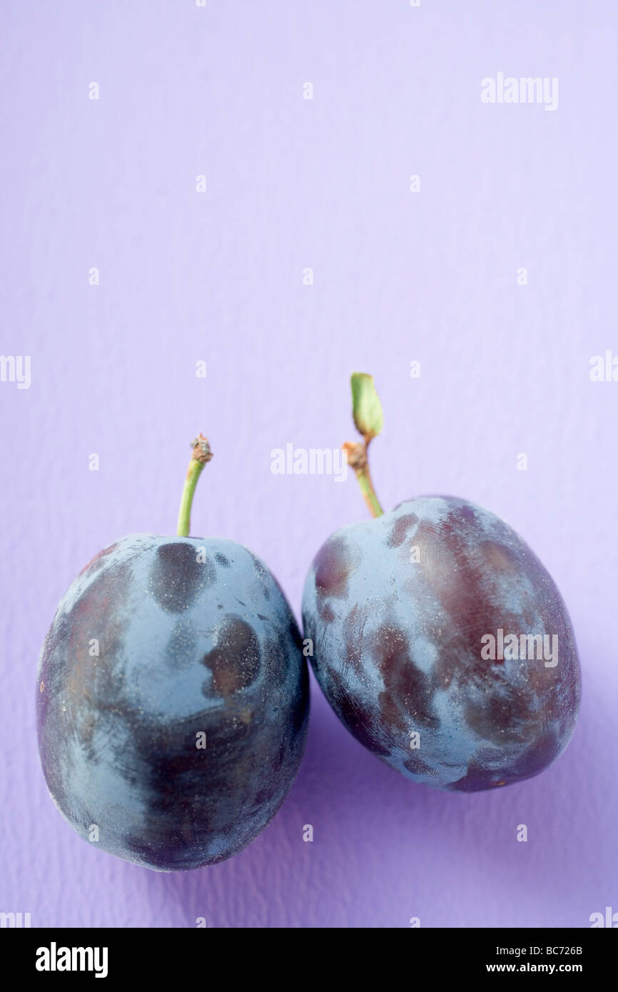 Two plums Stock Photo - Alamy