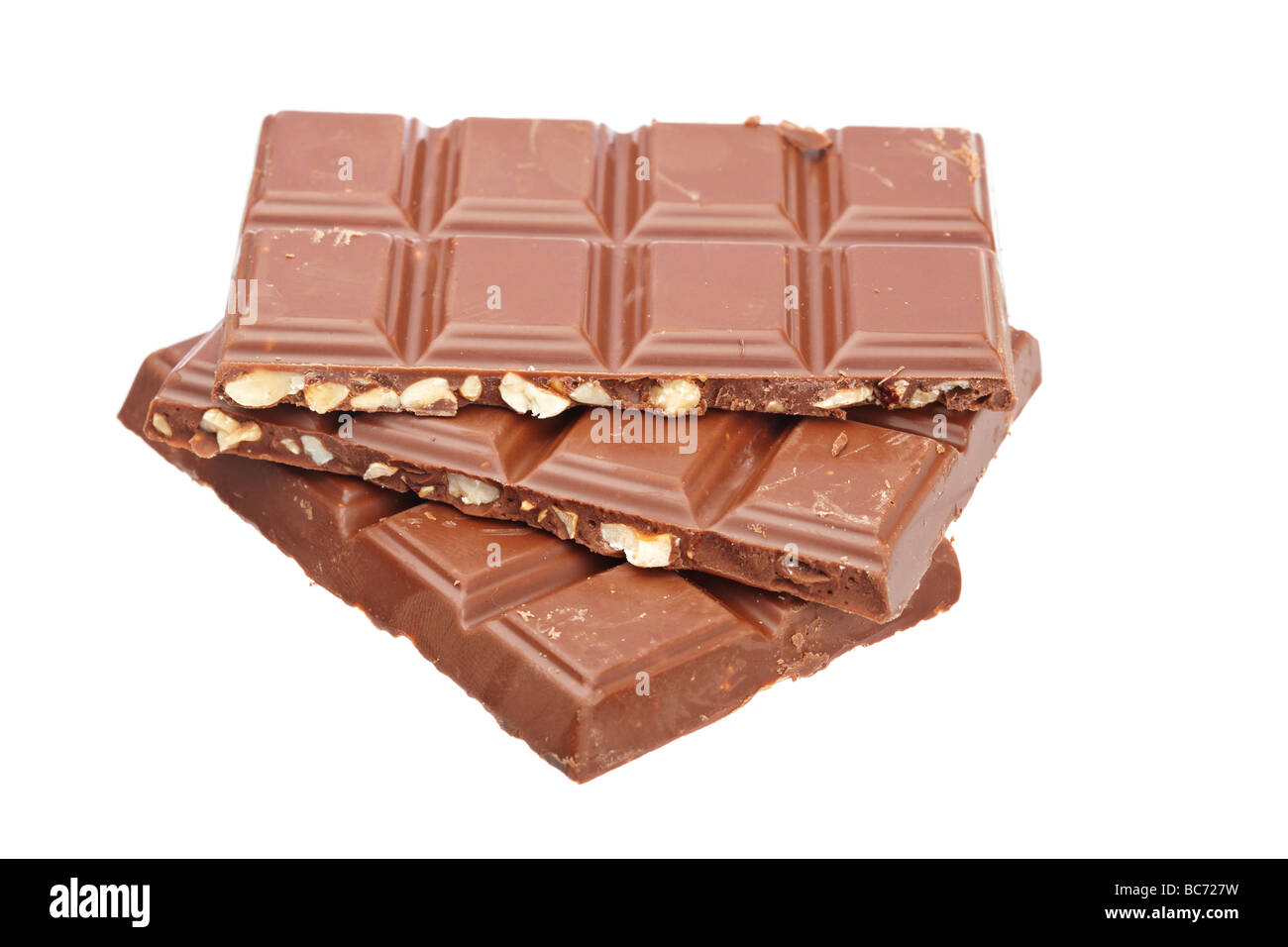 Blocks of chocolate isolated on white background Shallow depth of field ...