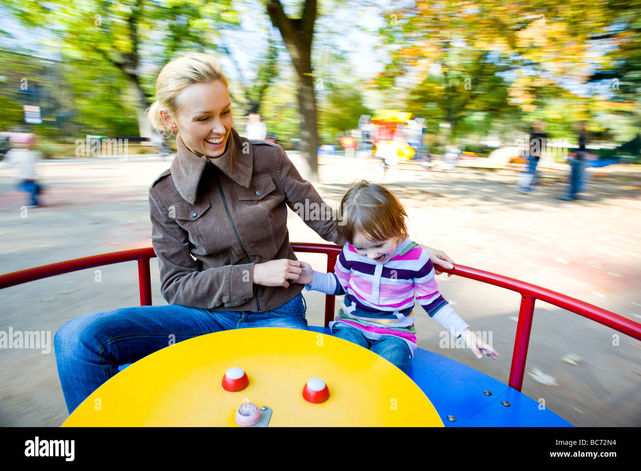 mother and child in playground Stock Photo - Alamy