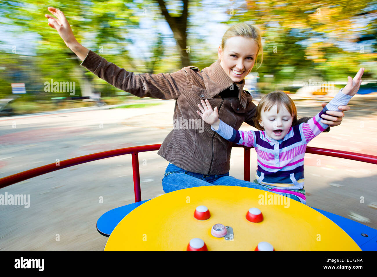 mother and child in playground Stock Photo - Alamy