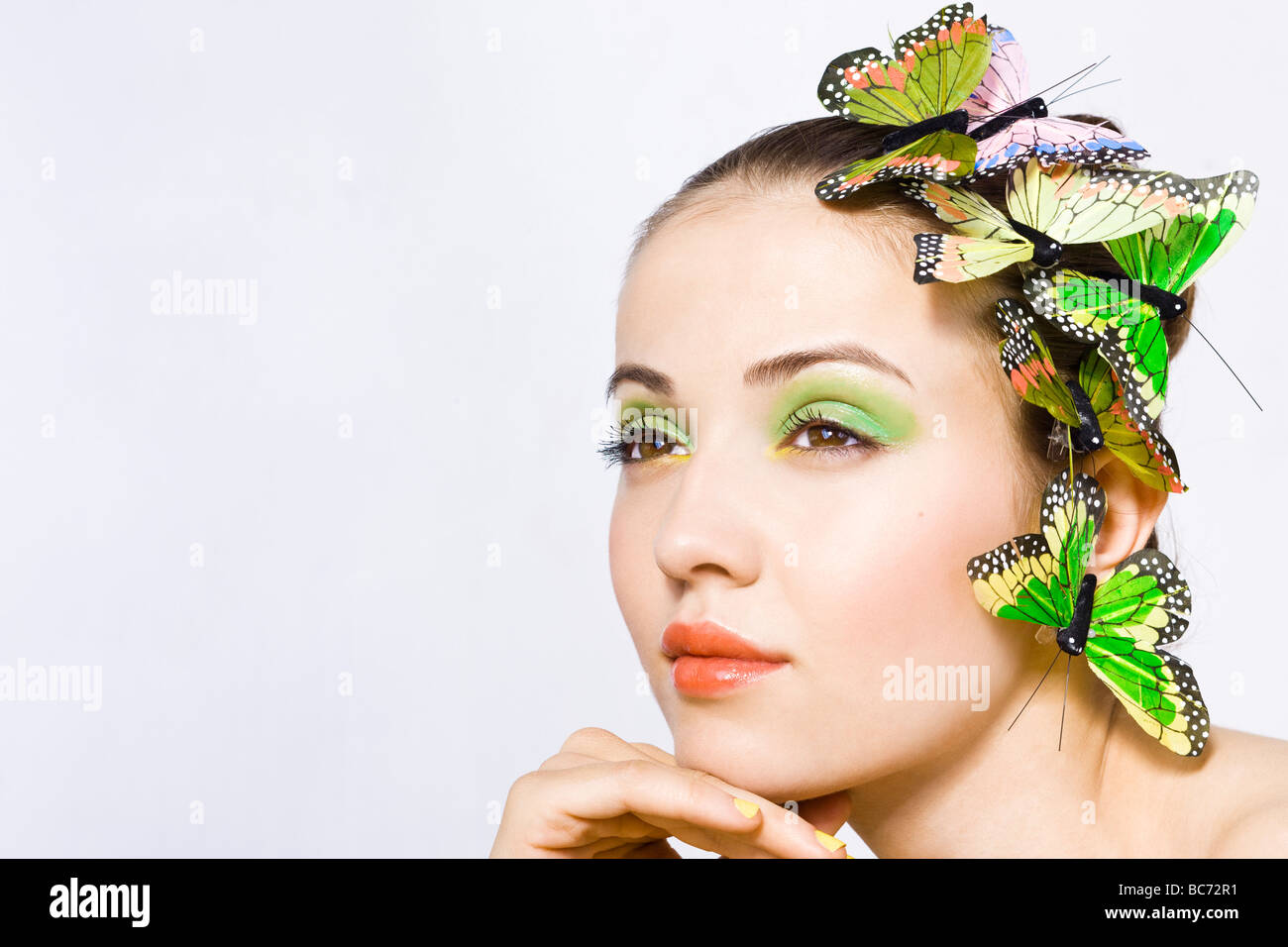 woman with butterflies on head Stock Photo - Alamy