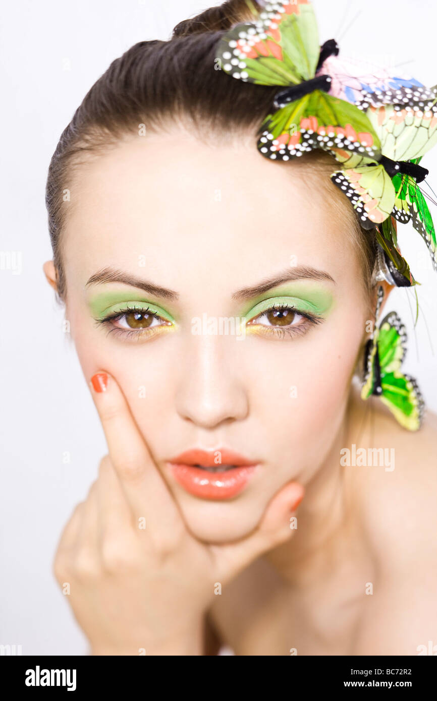 woman with butterflies on head Stock Photo - Alamy