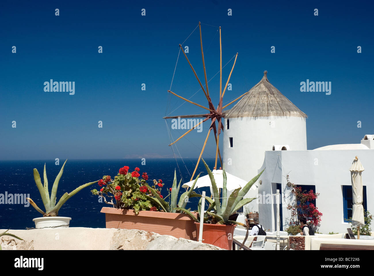 Windmill in Oia Santorini Stock Photo - Alamy