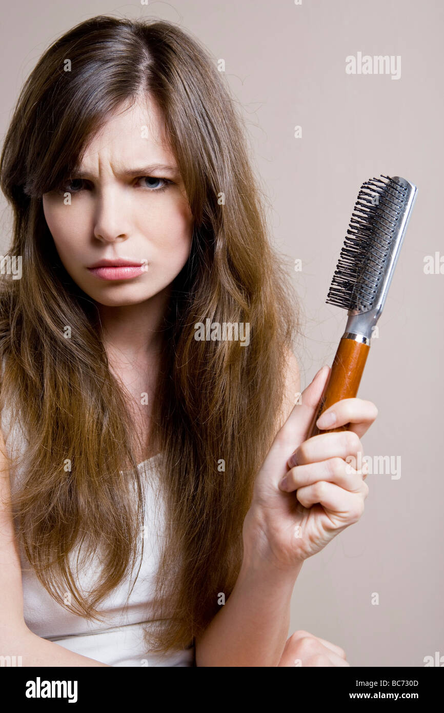 Brushing hair falling out hi-res stock photography and images - Alamy