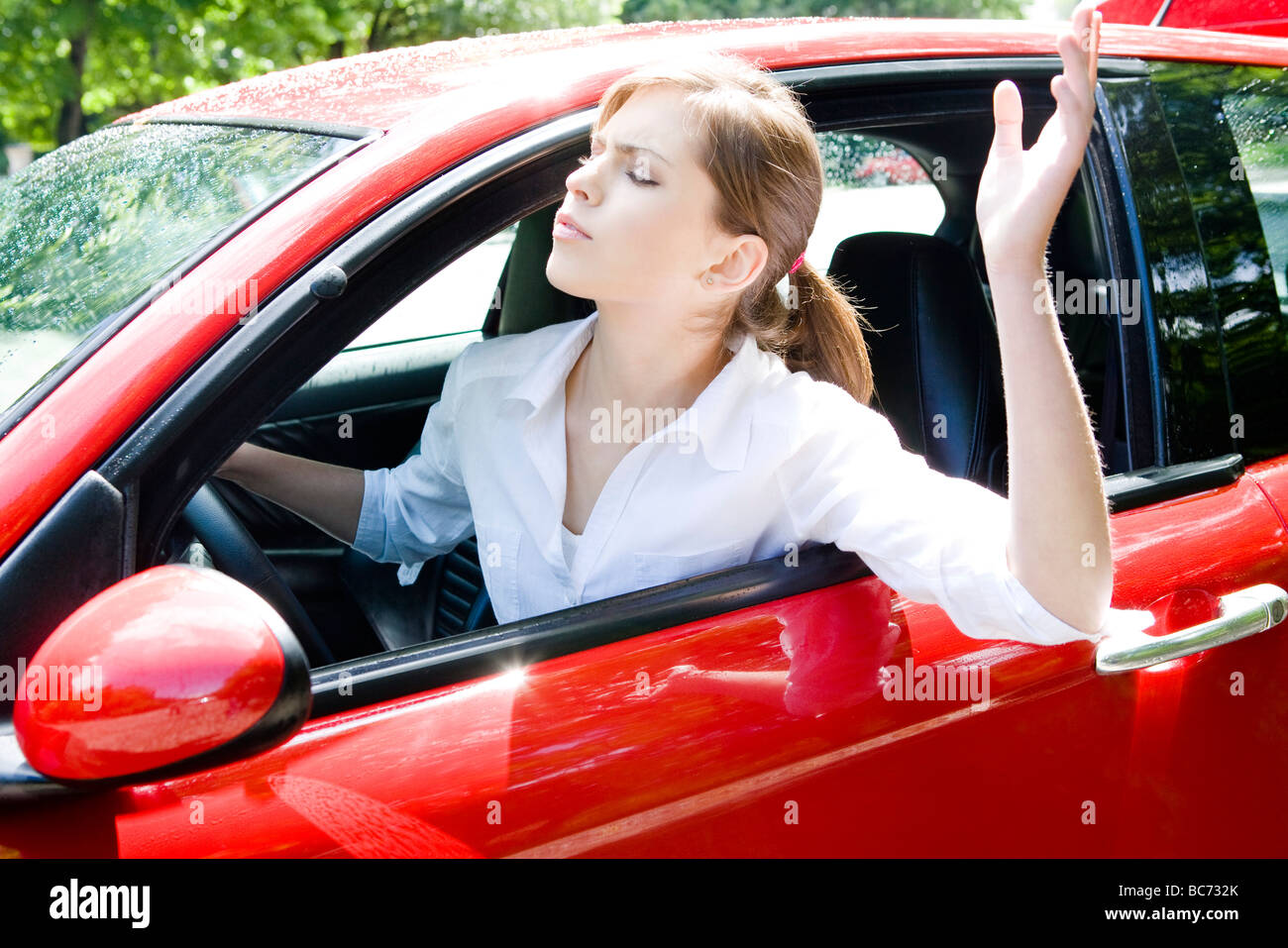 angry woman driving car Stock Photo - Alamy