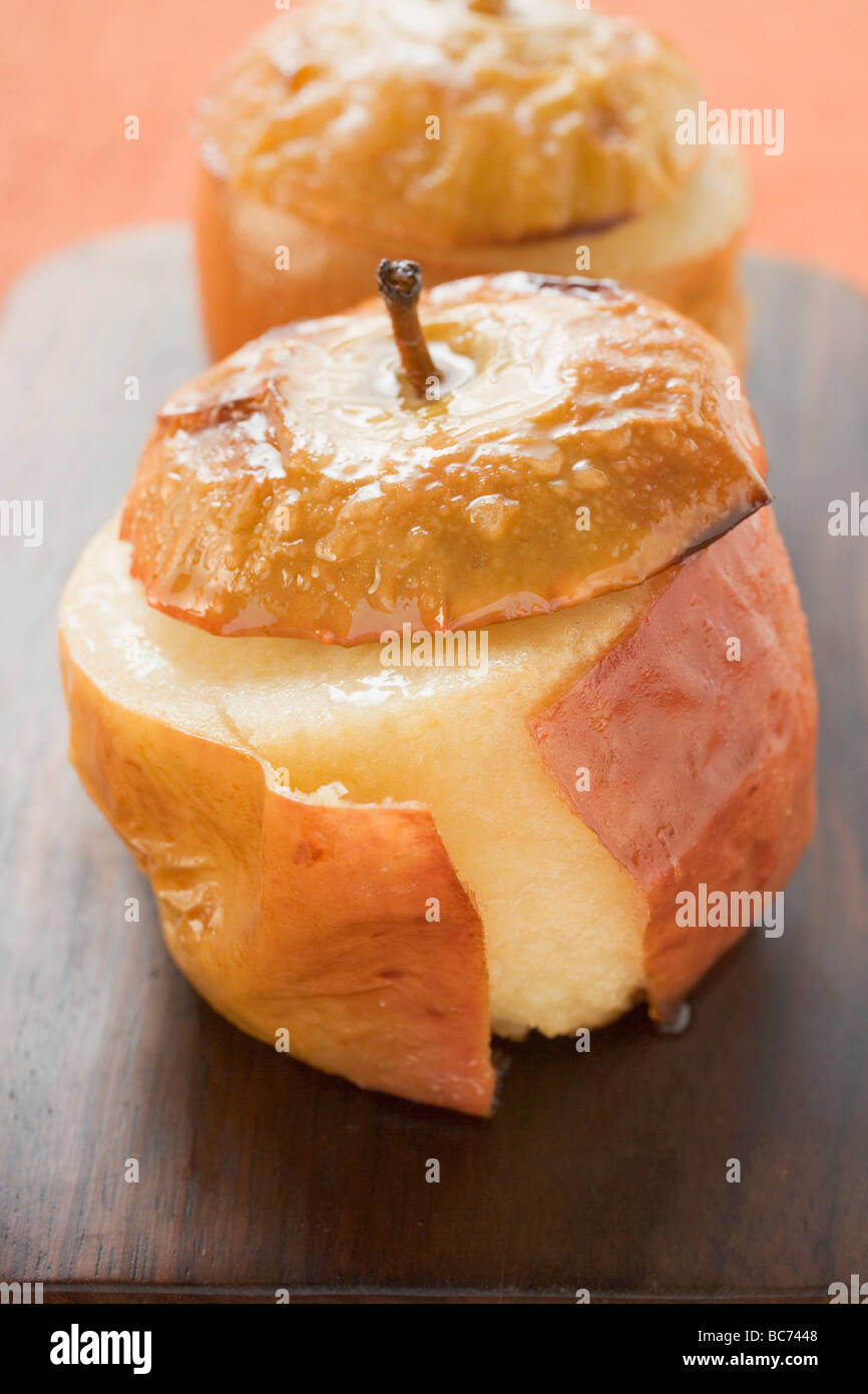 Two baked apples Stock Photo - Alamy