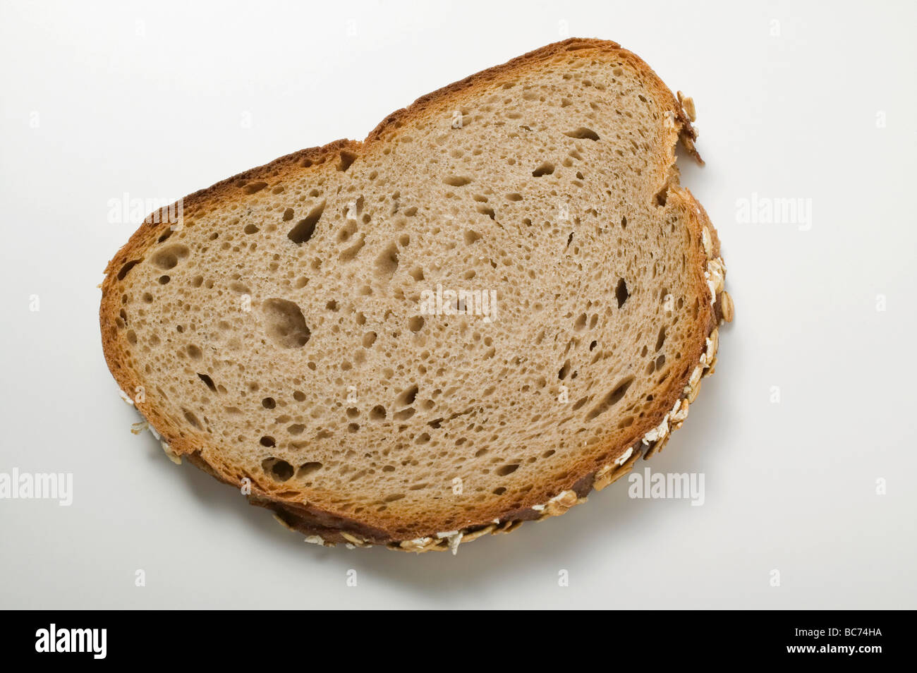 Slice of oat bread Stock Photo - Alamy