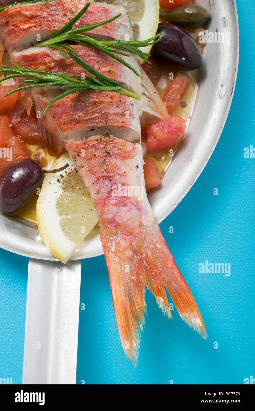 Fried red mullet on Mediterranean vegetables (detail Stock Photo - Alamy