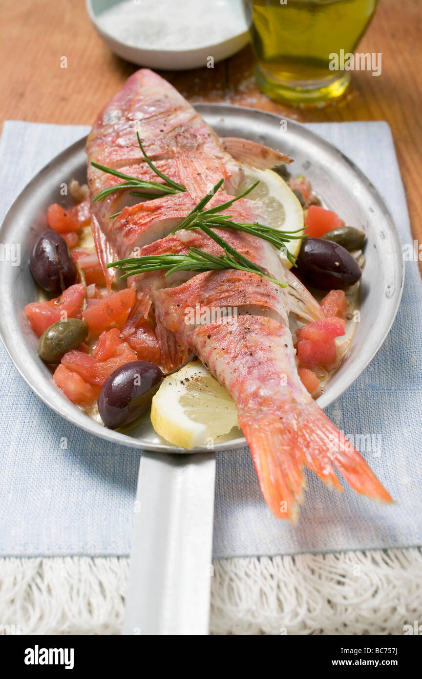 Fried red mullet on Mediterranean vegetables Stock Photo - Alamy