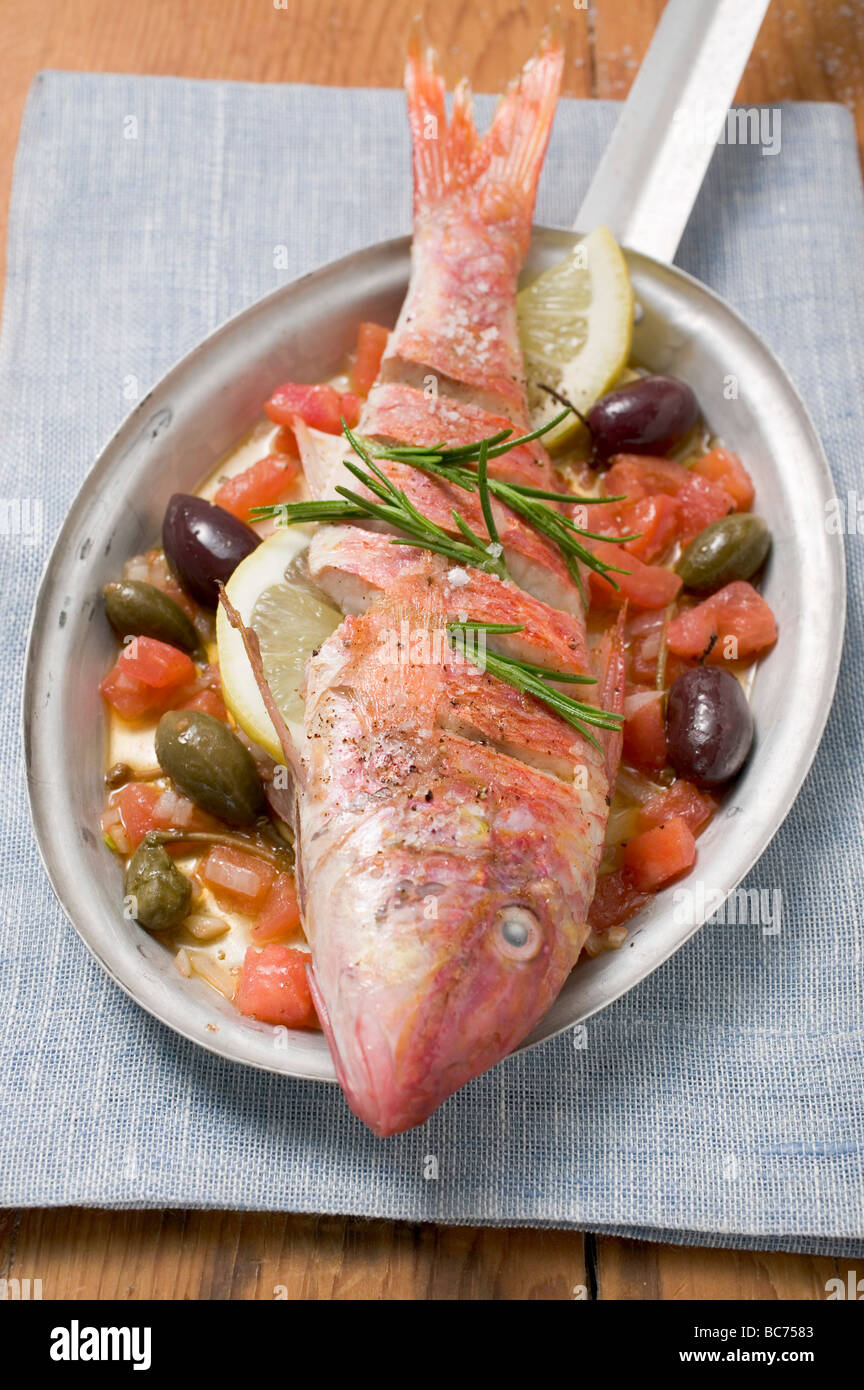 Fried red mullet on Mediterranean vegetables Stock Photo - Alamy