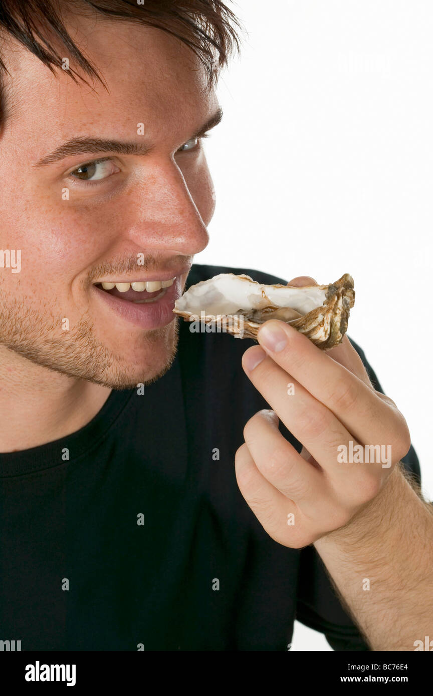 Man eating a fresh oyster Stock Photo - Alamy Man eating a fresh oyster Stock Photo - Alamy