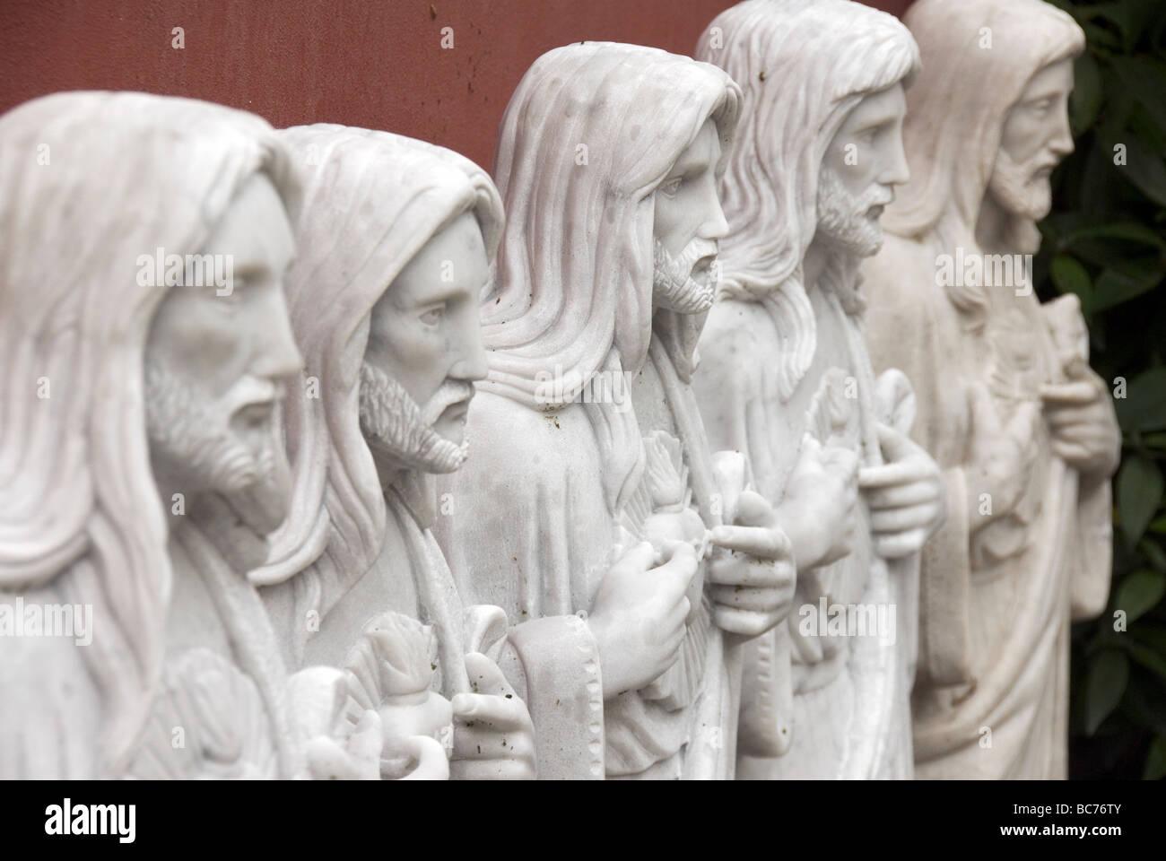 A row of statues of Jesus Christ sculpted out of pure white Carrara ...