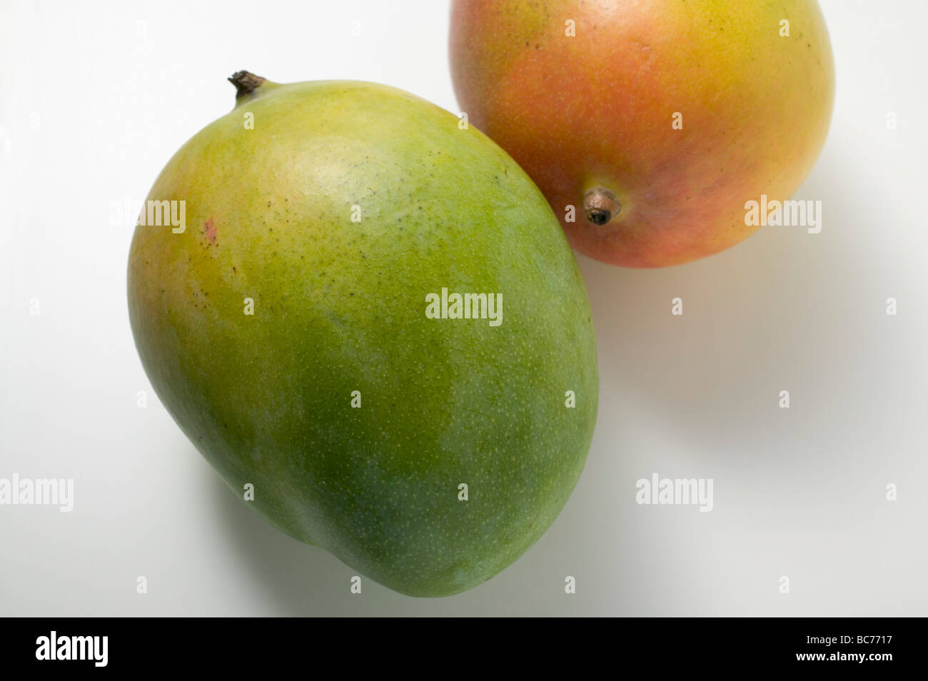 Two mangos Stock Photo - Alamy