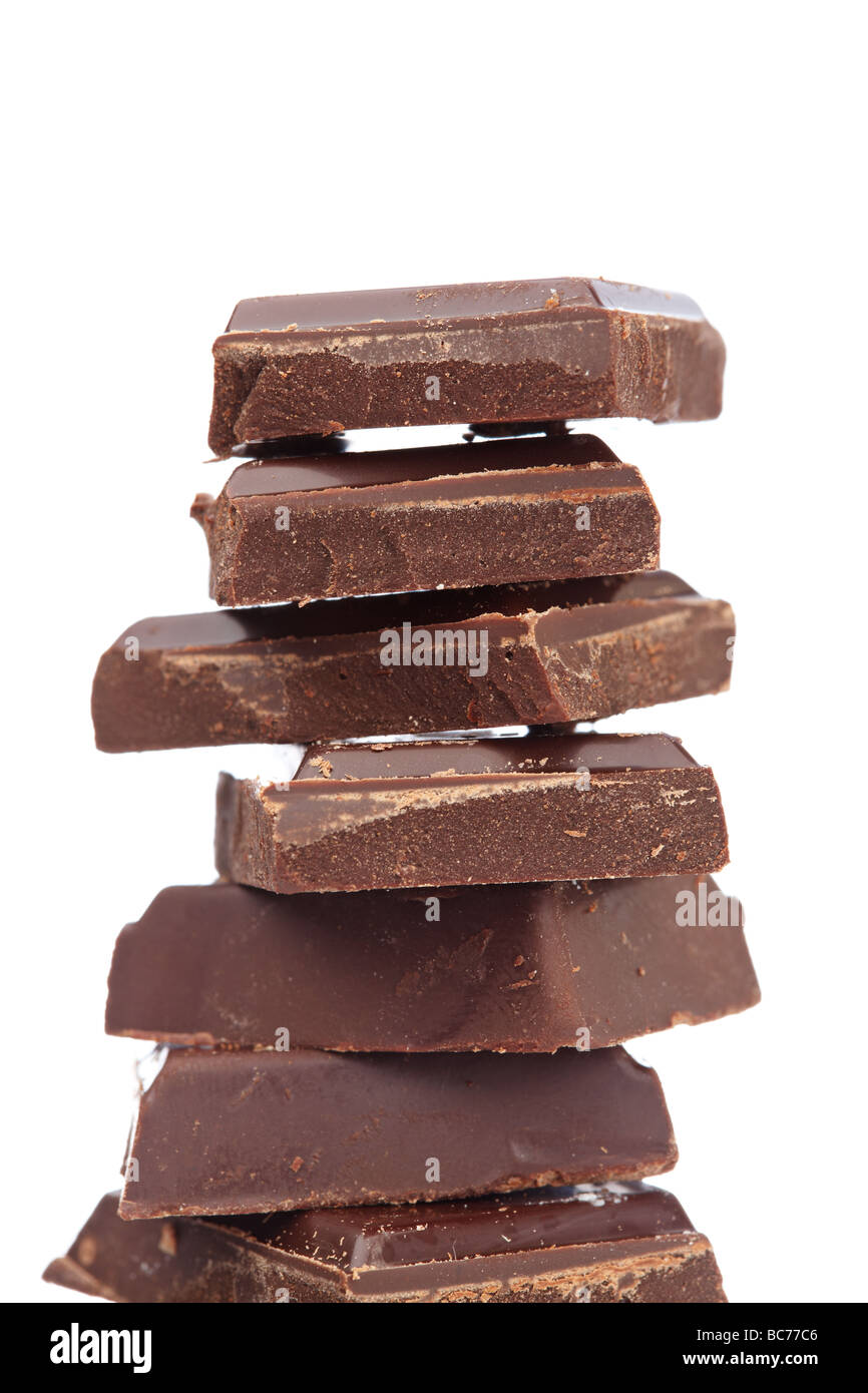 Blocks of chocolate isolated on white background Shallow depth of field ...