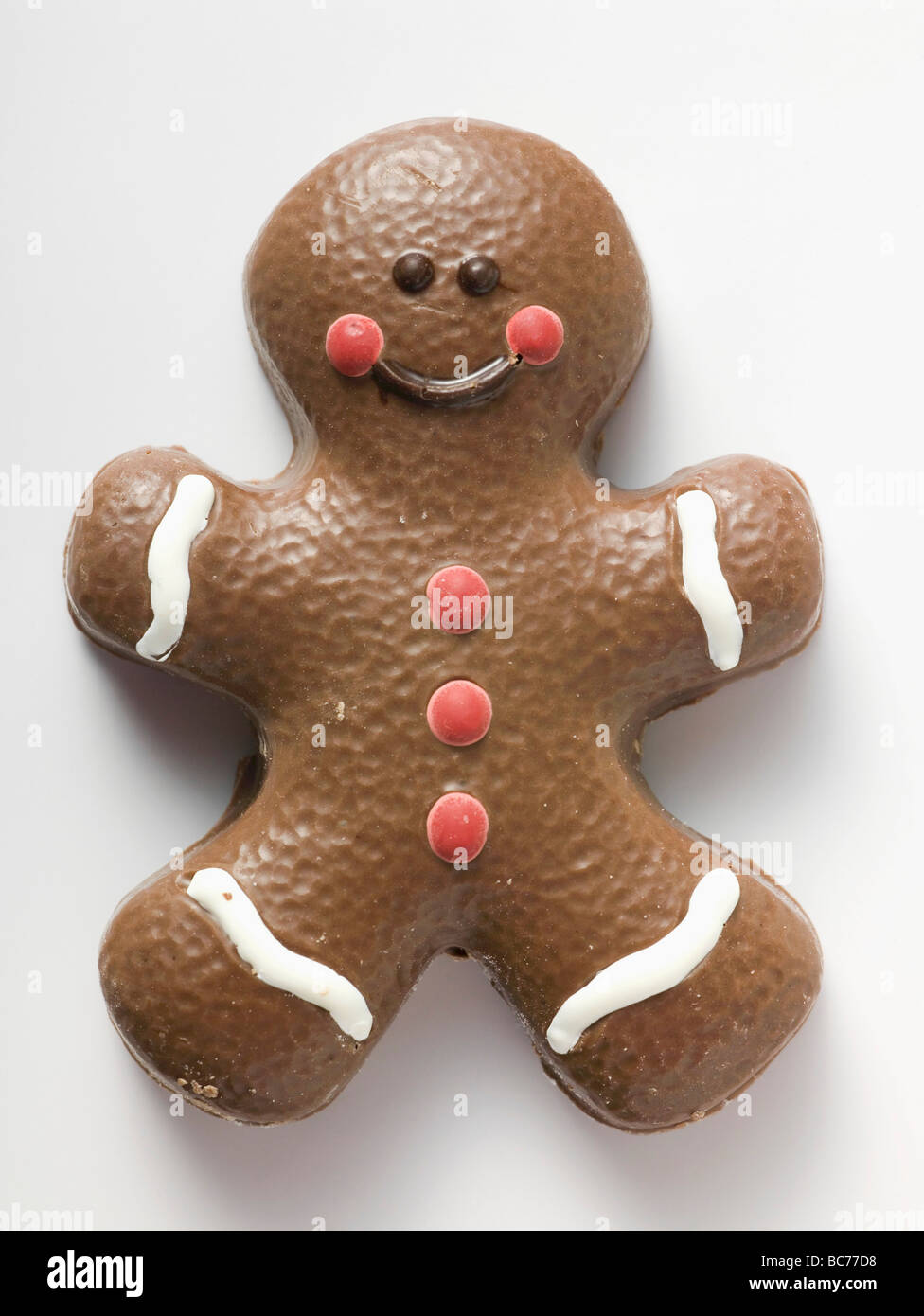 Chocolate-coated gingerbread man Stock Photo - Alamy