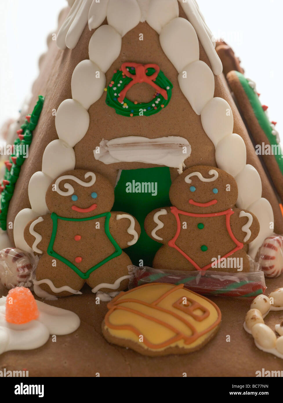 Gingerbread house with gingerbread people Stock Photo - Alamy