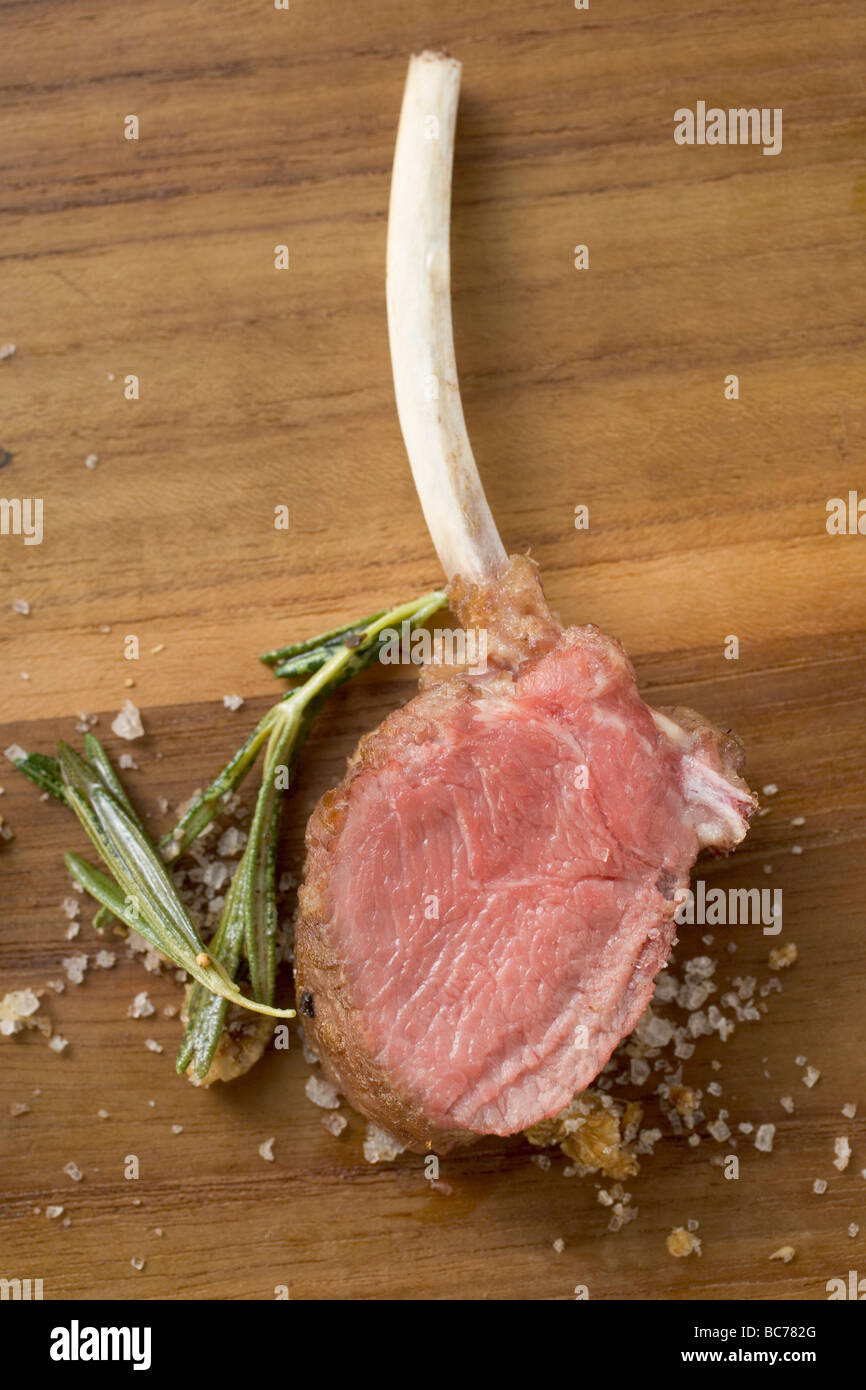 Lamb chop with rosemary and salt Stock Photo - Alamy