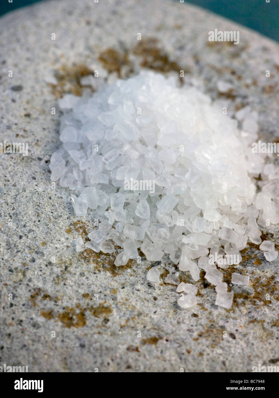 Coarse sea salt on a stone Stock Photo - Alamy