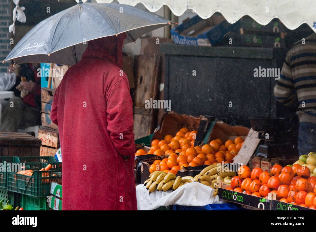Moroccan Man on a Rainy Day in Tangier Morocco Stock Photo - Alamy