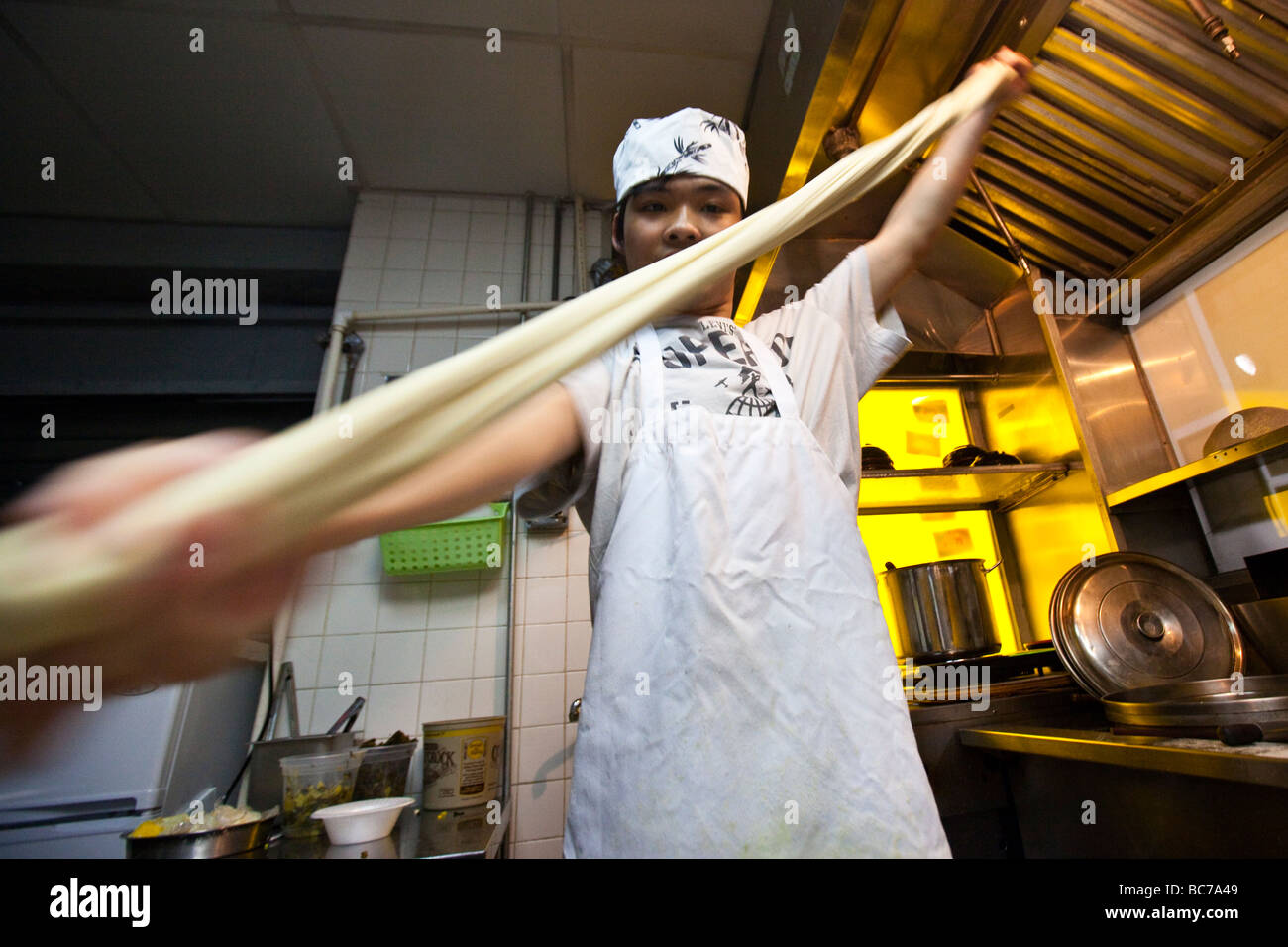 Noodle pulling hi-res stock photography and images - Alamy