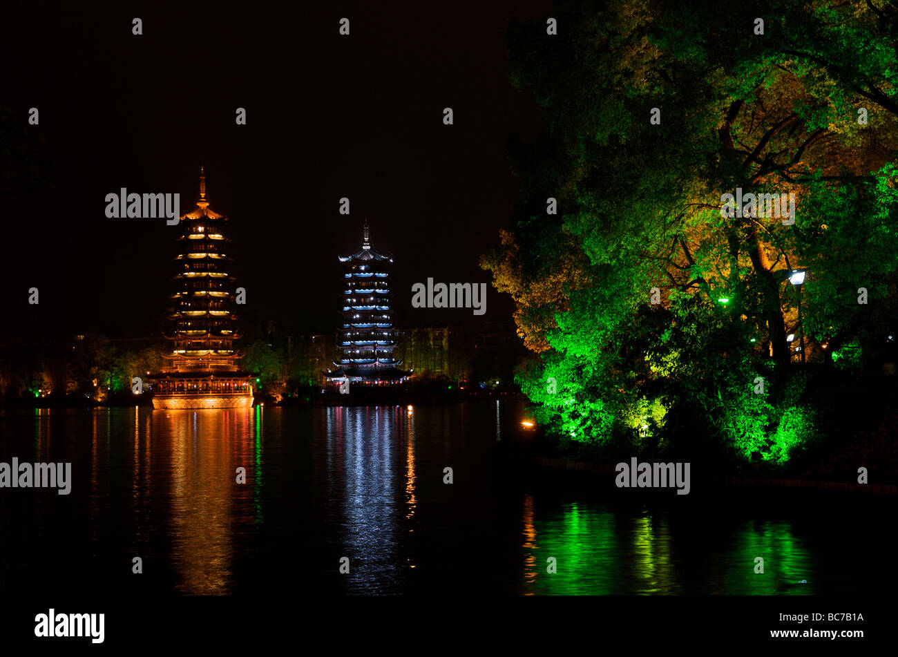 Sun Moon Pagodas at night Cedar Lake Guilin Guangxi China Stock Photo ...