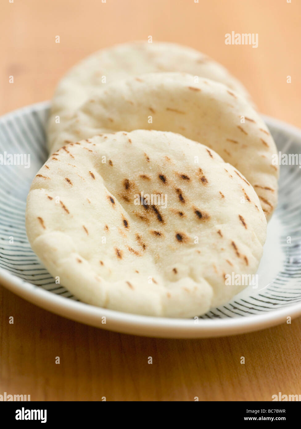 Three small flatbreads Stock Photo - Alamy