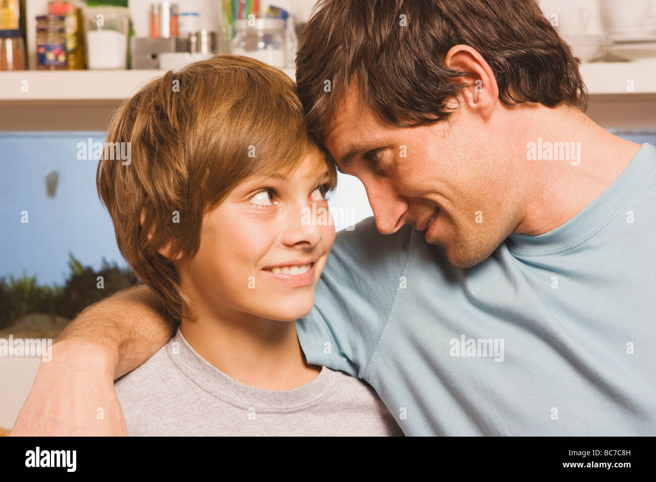 Father and son (13-14) embracing, portrait Stock Photo - Alamy