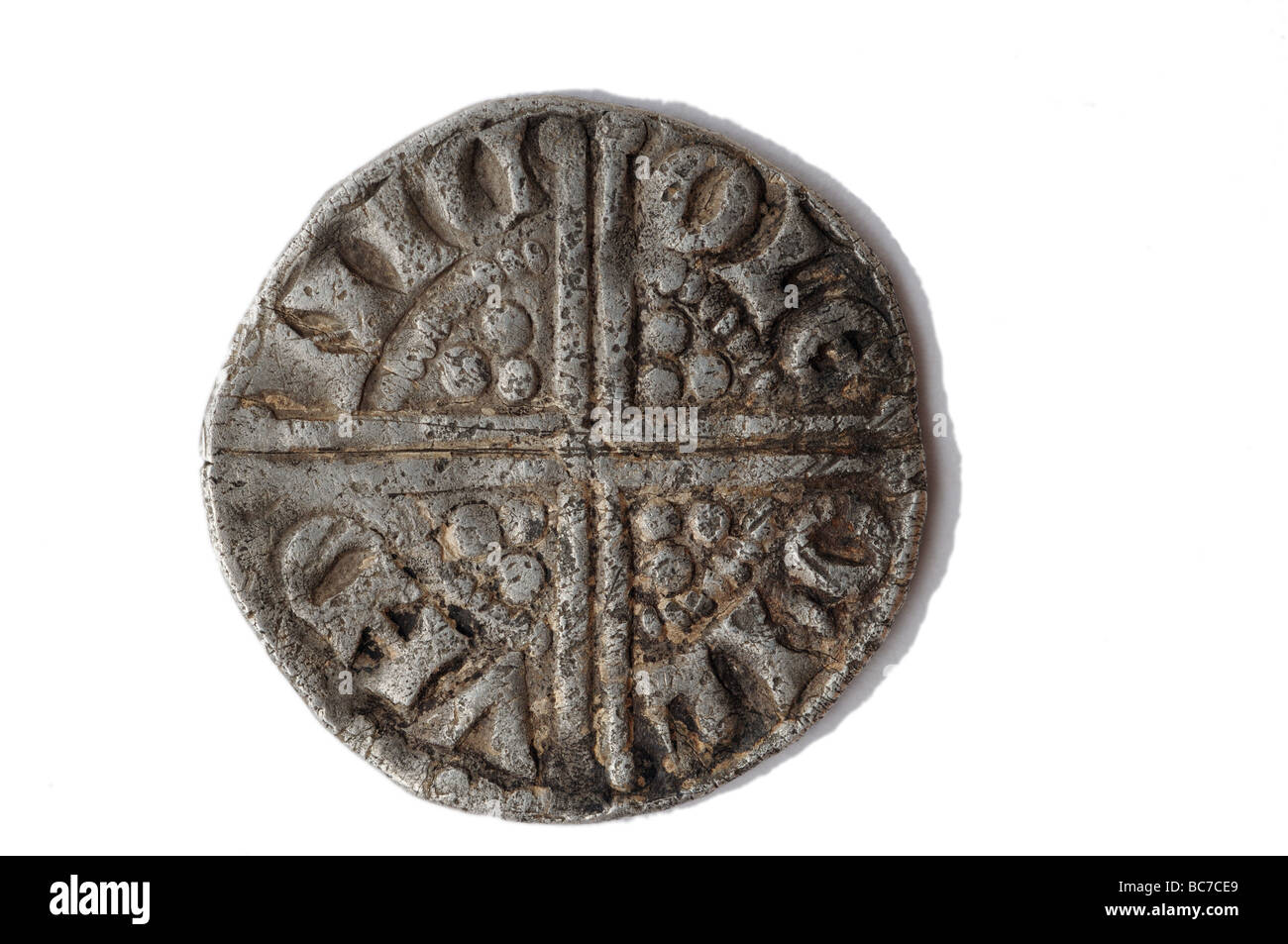 An old long cross hammered silver penny Stock Photo - Alamy
