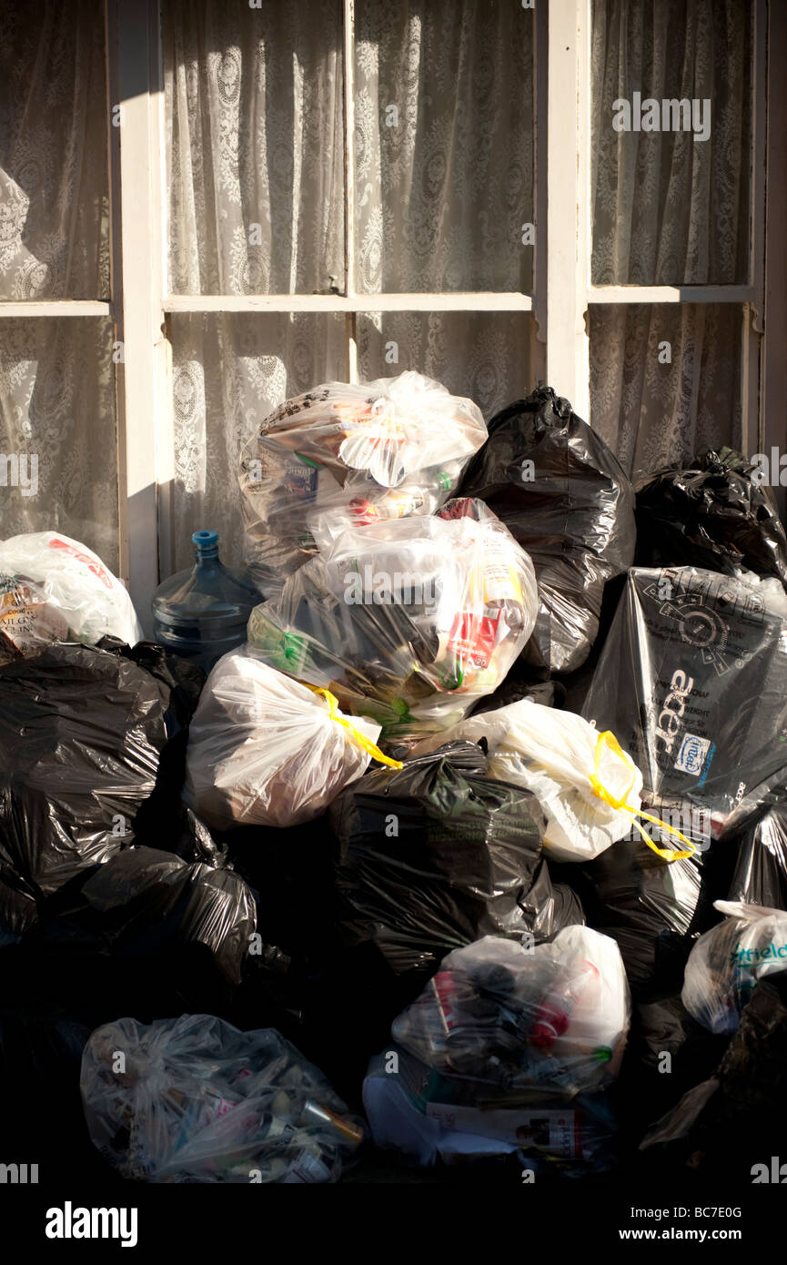 Piles of rubbish bags piled up outside a student house at the end of ...