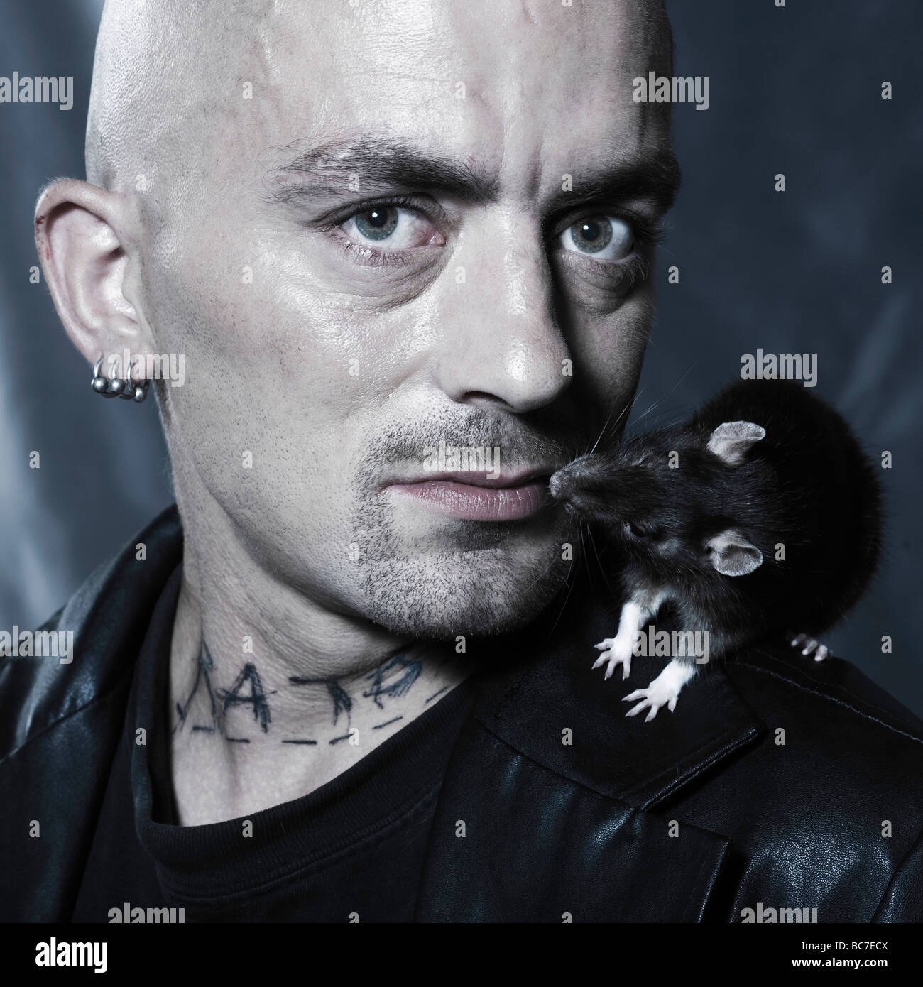 portrait studio on isolated background of a strange punk man portrait ...